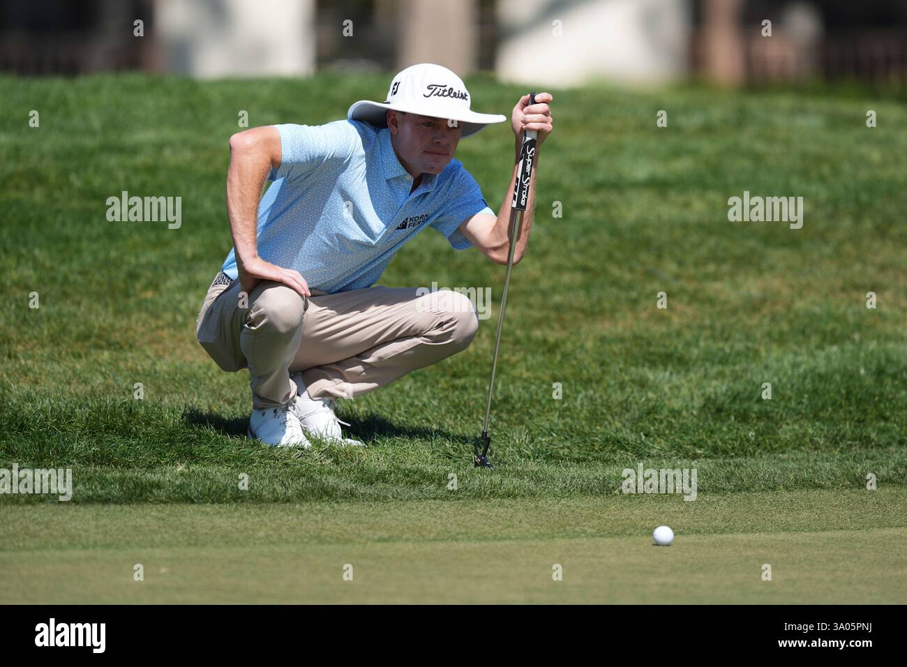 Joe Highsmith lines up a putt on the second green during the final ...