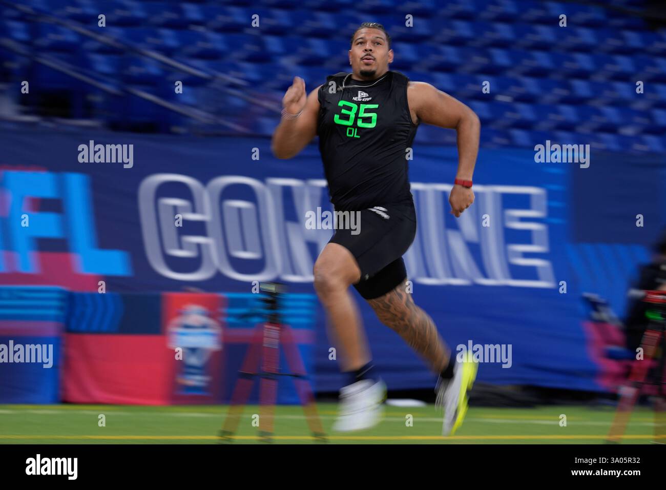 Texas Tech offensive lineman Caleb Rogers runs the 40-yard dash at the ...