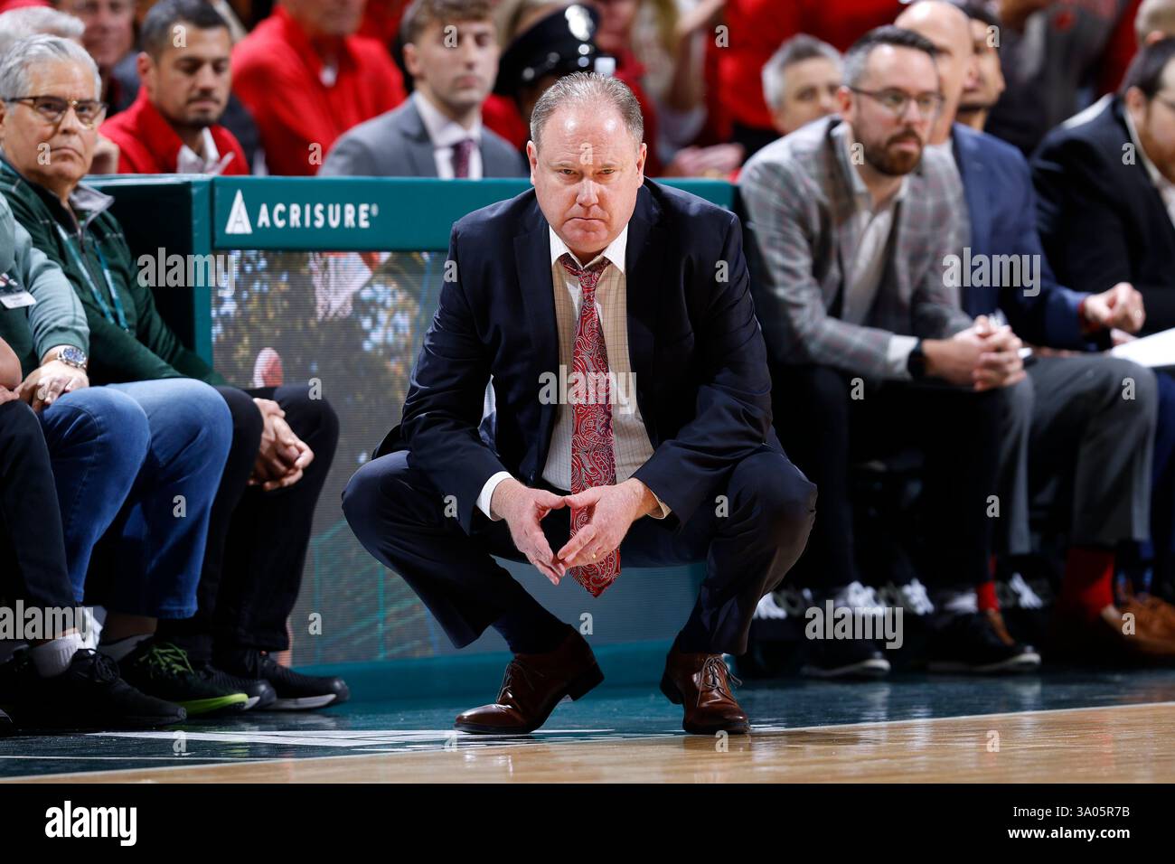 Wisconsin coach Greg Gard, center, looks on during the second half of ...