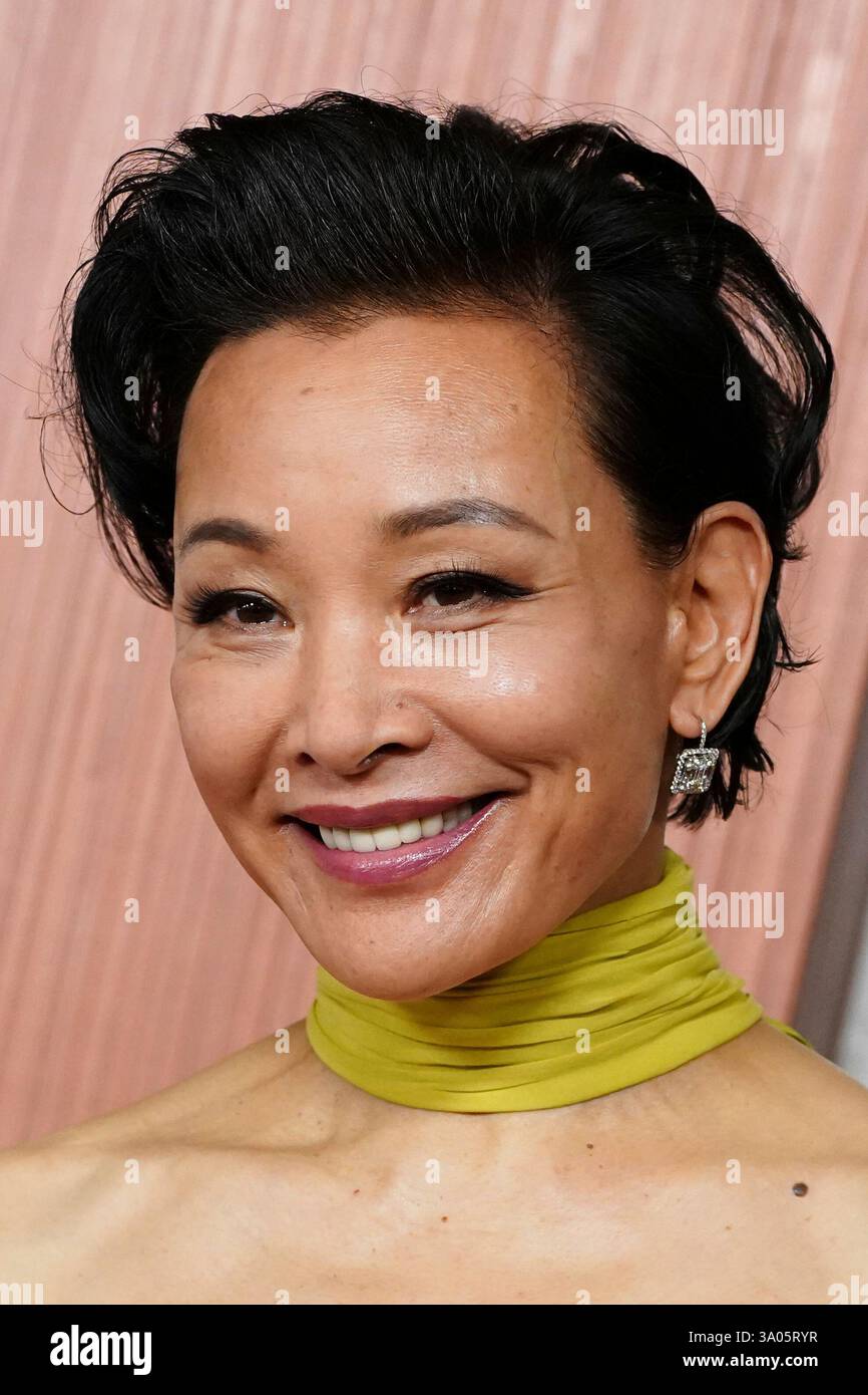 Joan Chen arrives at the Oscars on Sunday, March 2, 2025, at the Dolby Theatre in Los Angeles ...