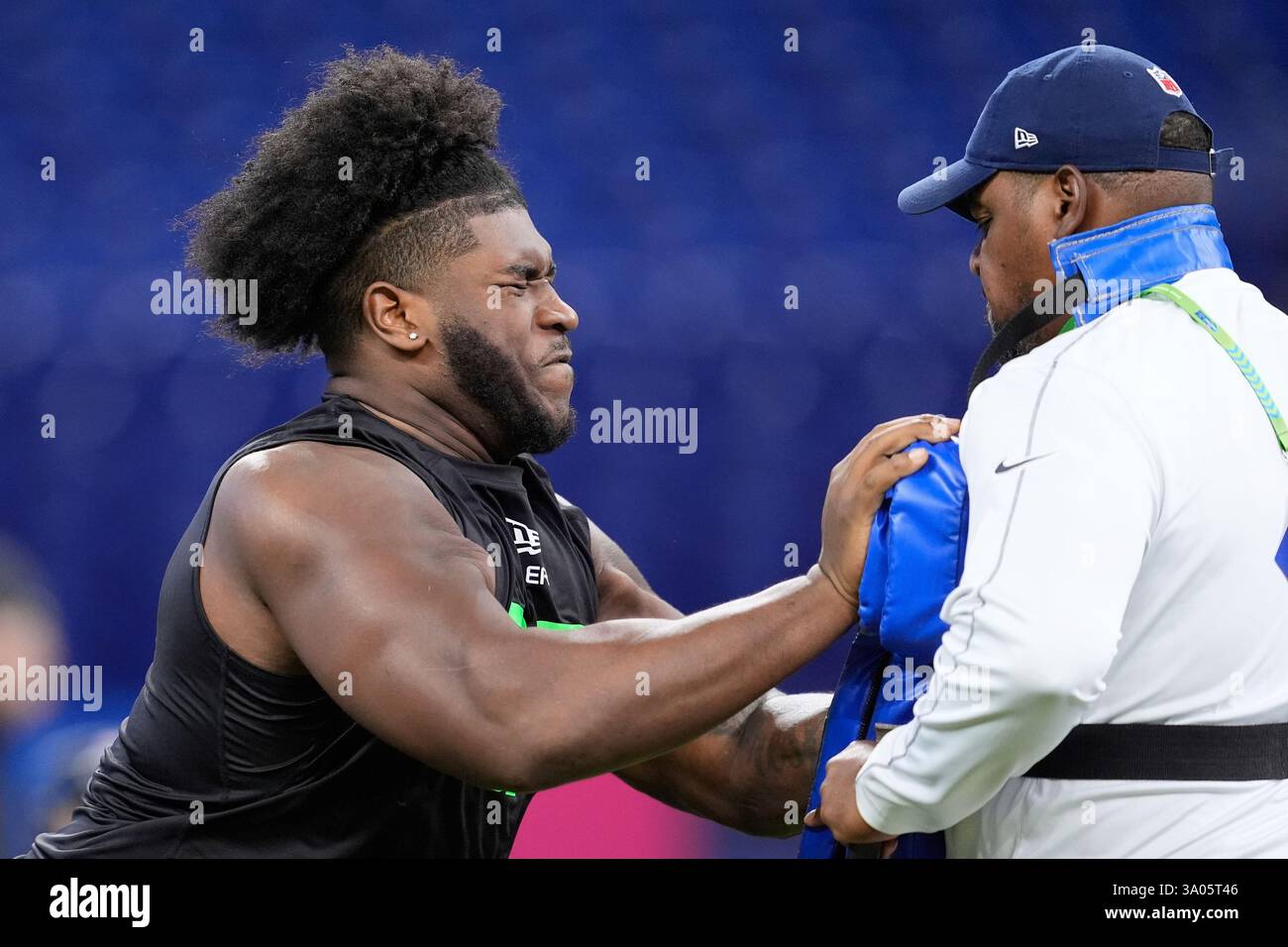 Alabama offensive lineman Tyler Booker runs a drill at the NFL football ...