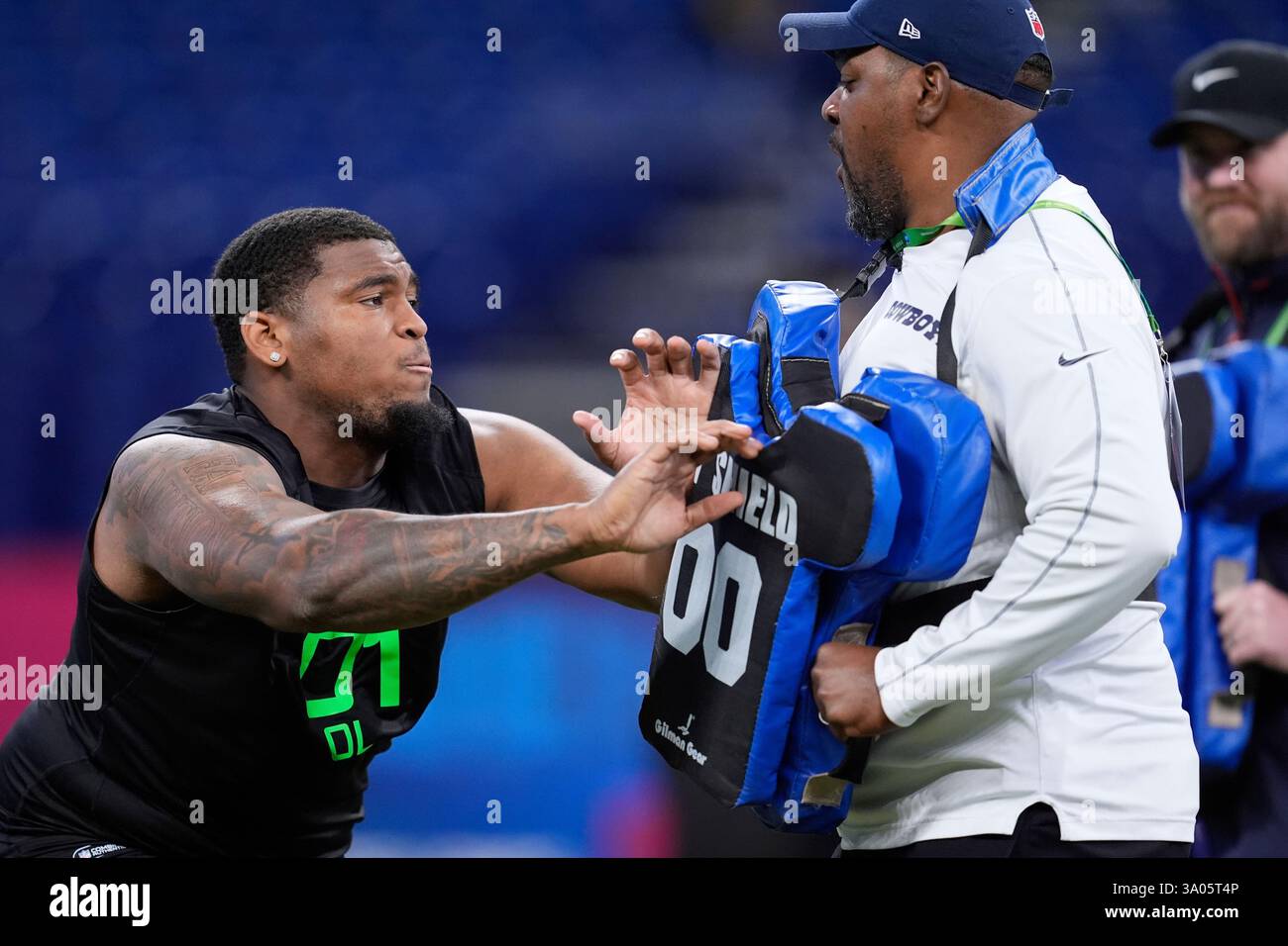 Texas offensive lineman Kelvin Banks Jr. runs a drill at the NFL ...