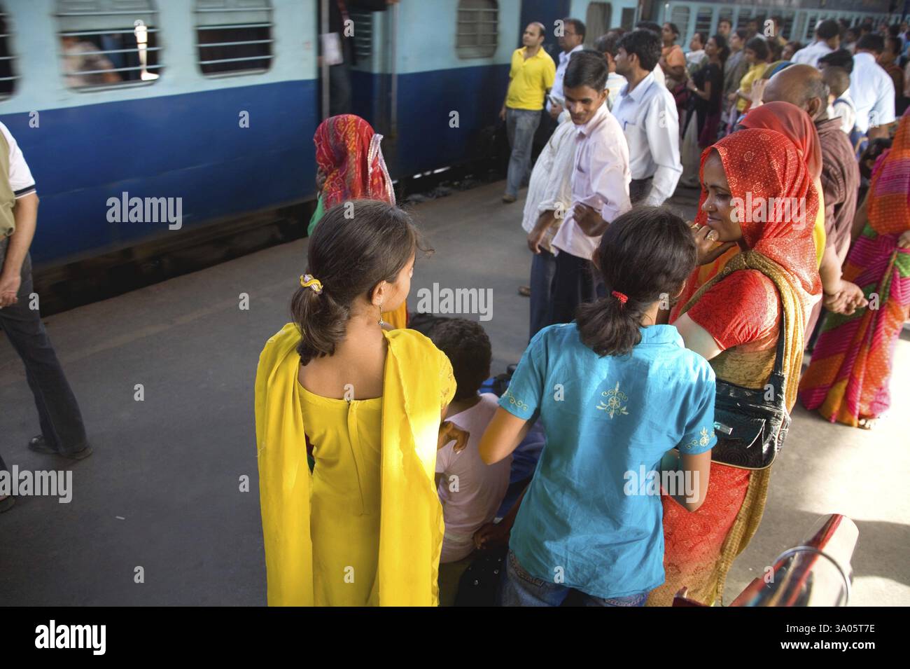 Commuters waiting to get into local train on platform of Borivali ...