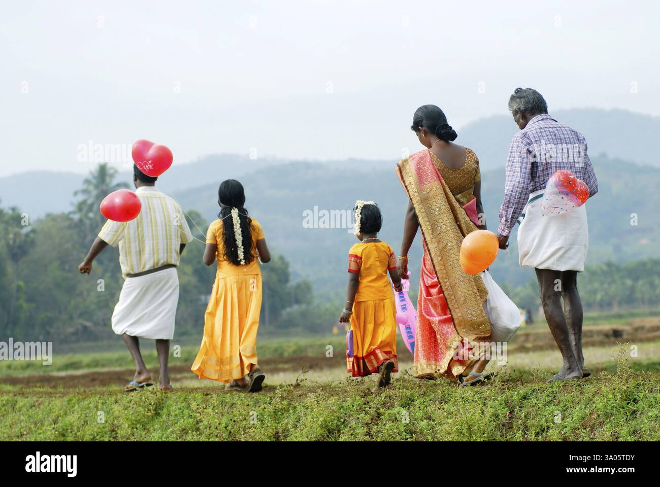 People carrying balloons for festival, kerala, India, Asia Stock Photo ...