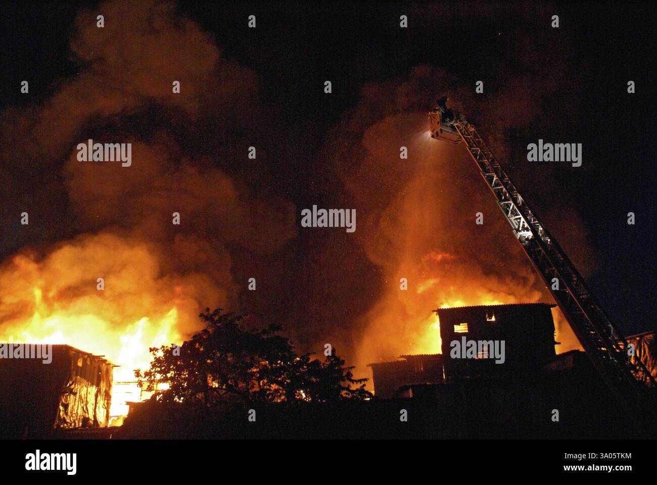 Firefighters dousing fire using snorkel in Behrampada slum, Bandra ...