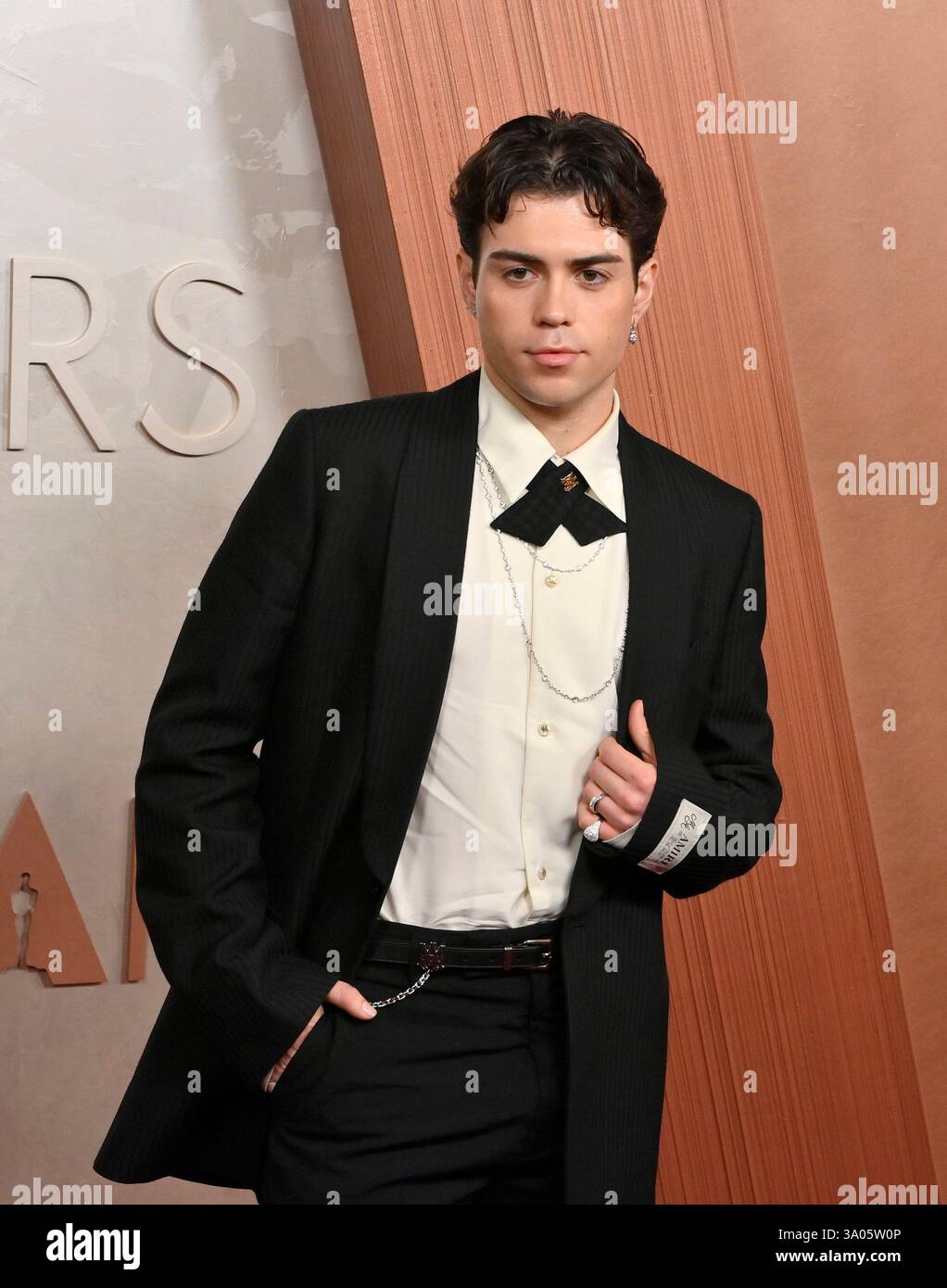 Benji Krol arrives on the red carpet for the 97th Academy Awards in the ...
