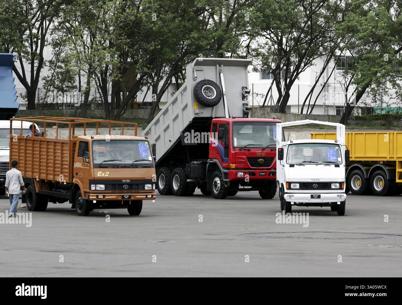 Various commercial products like matadors, trucks parked at Tata motors ...