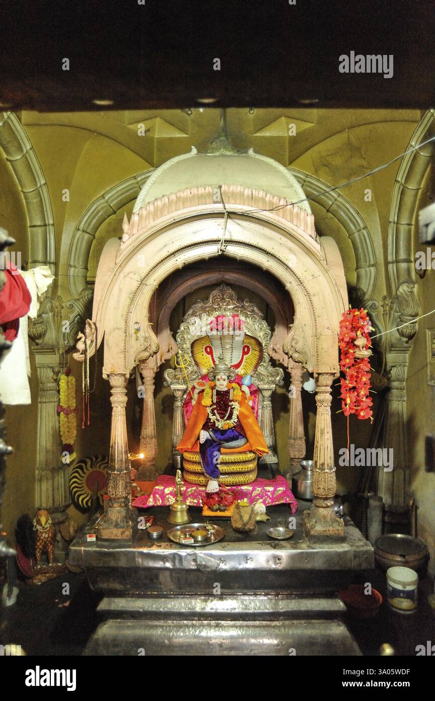 Lord Vishnu resting on sheshnag in Hindu temple altar, phaltan, satara ...