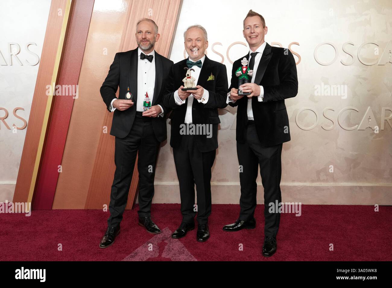 Richard Beek, from left, Nick Park, and Merlin Crossingham arrive at ...