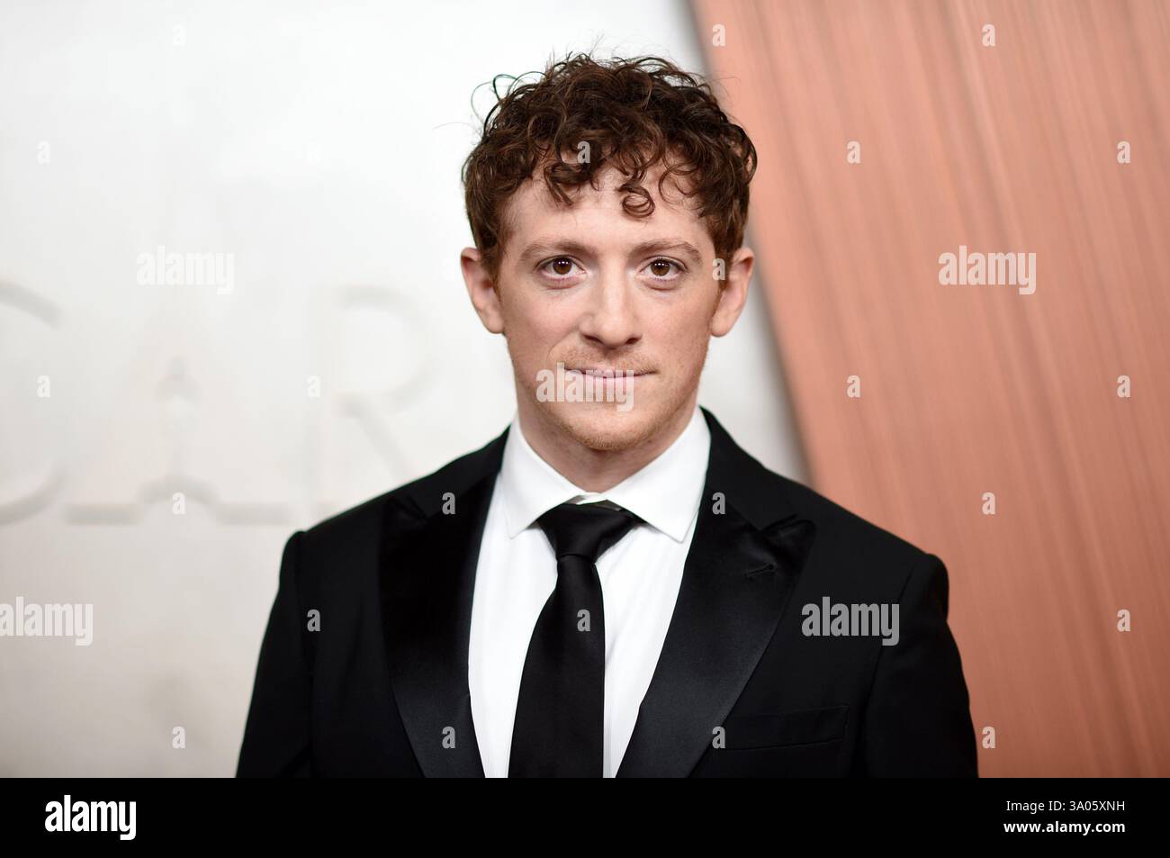 Ethan Slater arrives at the Oscars on Sunday, March 2, 2025, at the ...