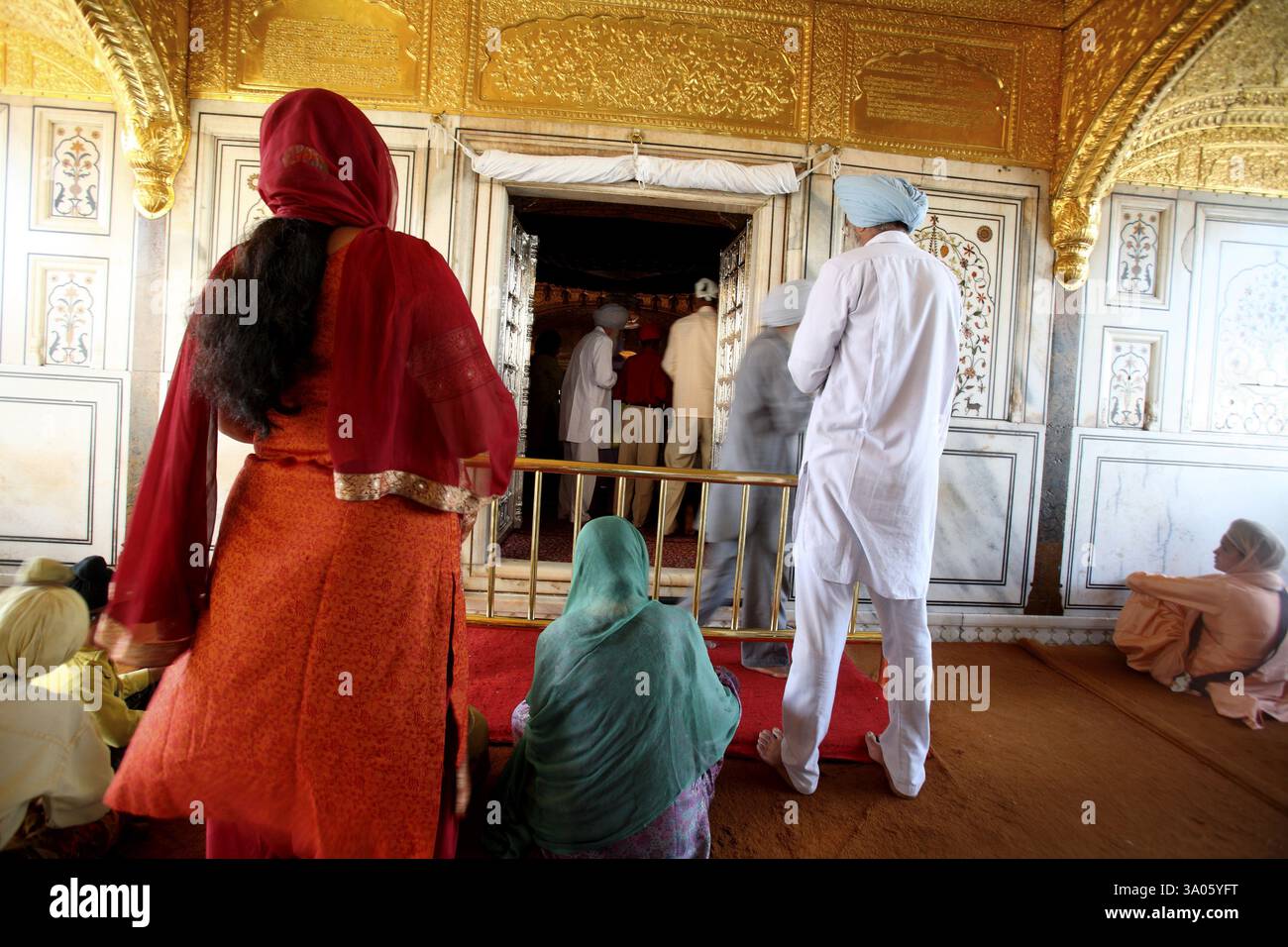 Devotees at Harmandir Sahib or Darbar Sahib or Golden temple in Amritsar, Punjab, India, Asia ...