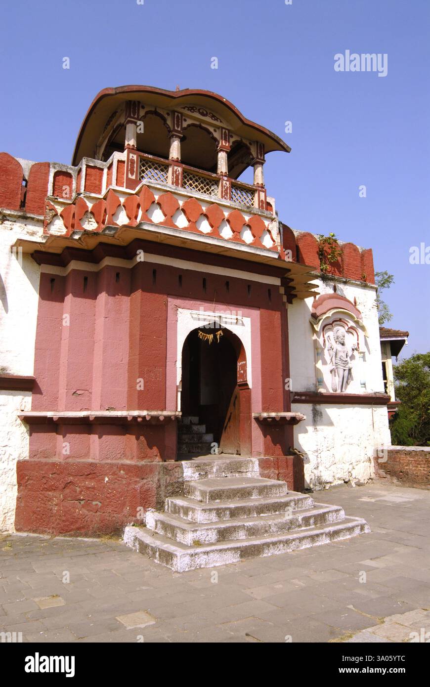Richly decorated entrance of Shree Devdeveshwar temple on top of ...