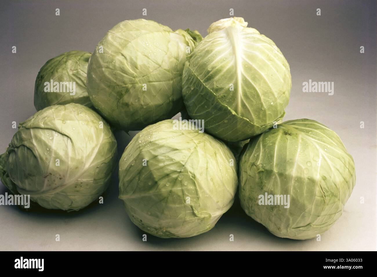 Six pieces of green vegetable cabbage Stock Photo - Alamy