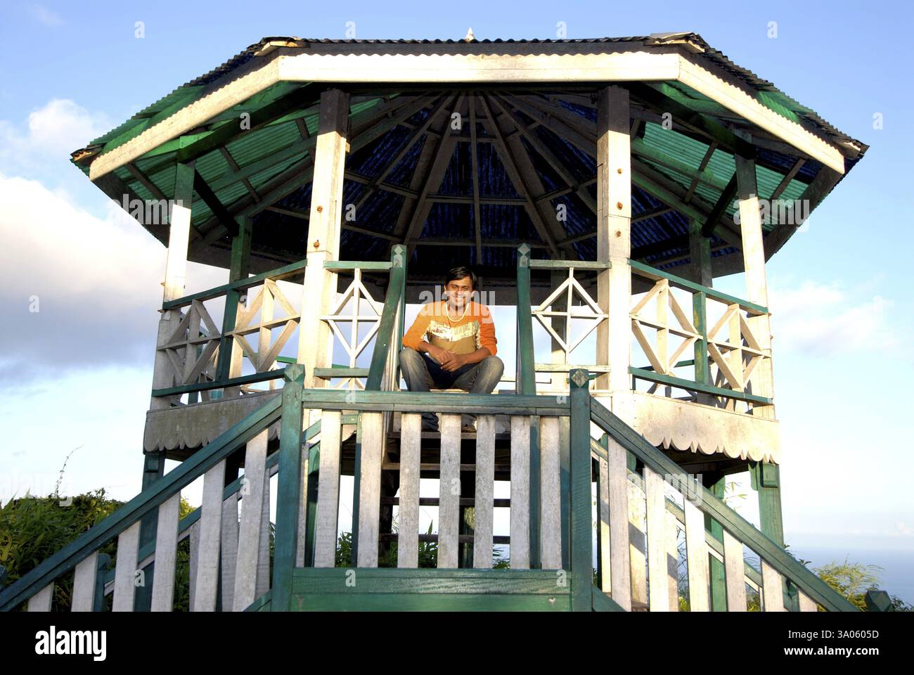 Man sitting in wooden structure at Diglipur north Andaman and Nicobar ...