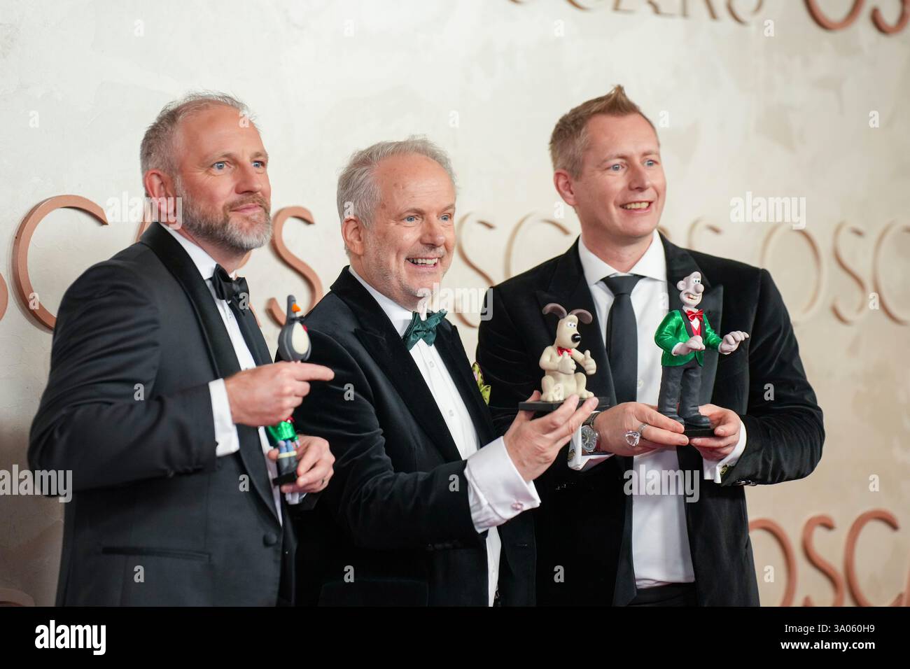 Richard Beek, from left, Nick Park and Merlin Crossingham arrive at the ...