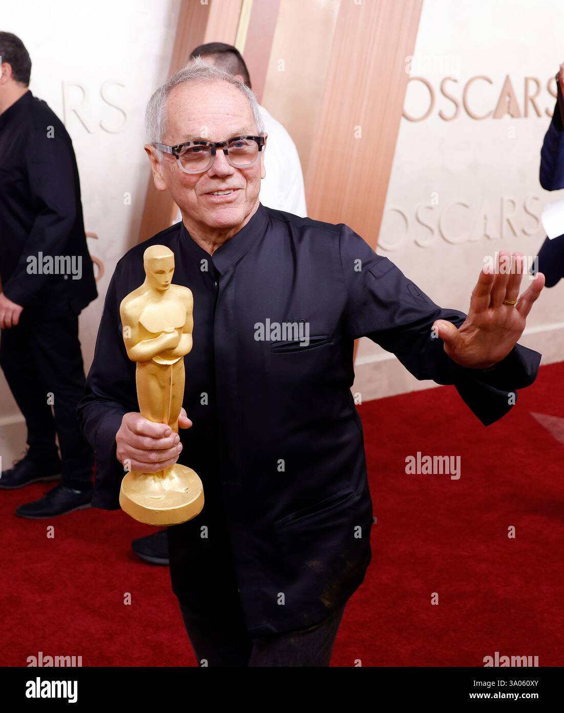 Wolfgang Puck arrives on the red carpet for the 97th Academy Awards in ...