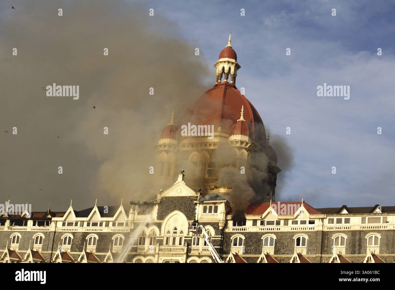 Smoke emits from Taj Mahal Hotel during terrorist attack by Deccan ...