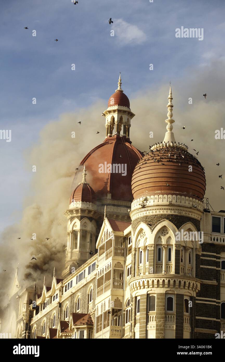 Smoke emits from Taj Mahal Hotel during terrorist attack by Deccan ...