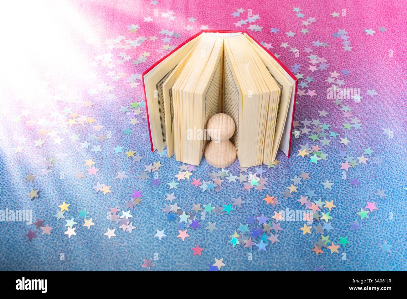 Islamic Holy Book Quran mini size decorated with stars Stock Photo - Alamy