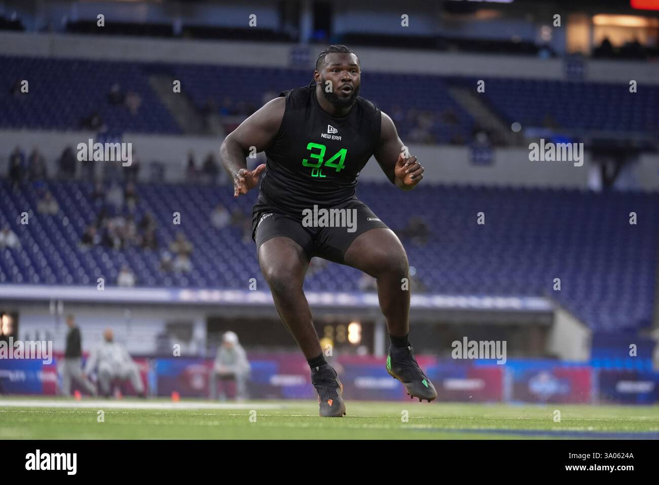 Miami offensive lineman Jalen Rivers runs a drill at the NFL football ...