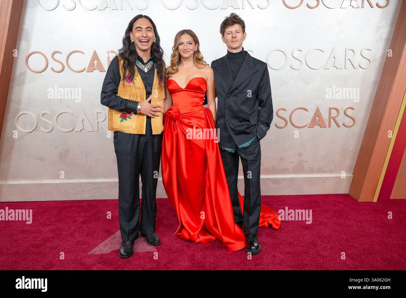 Julian Brave NoiseCat, from left, Emily Kassie and Kellen Quinn arrive at the Oscars on Sunday ...