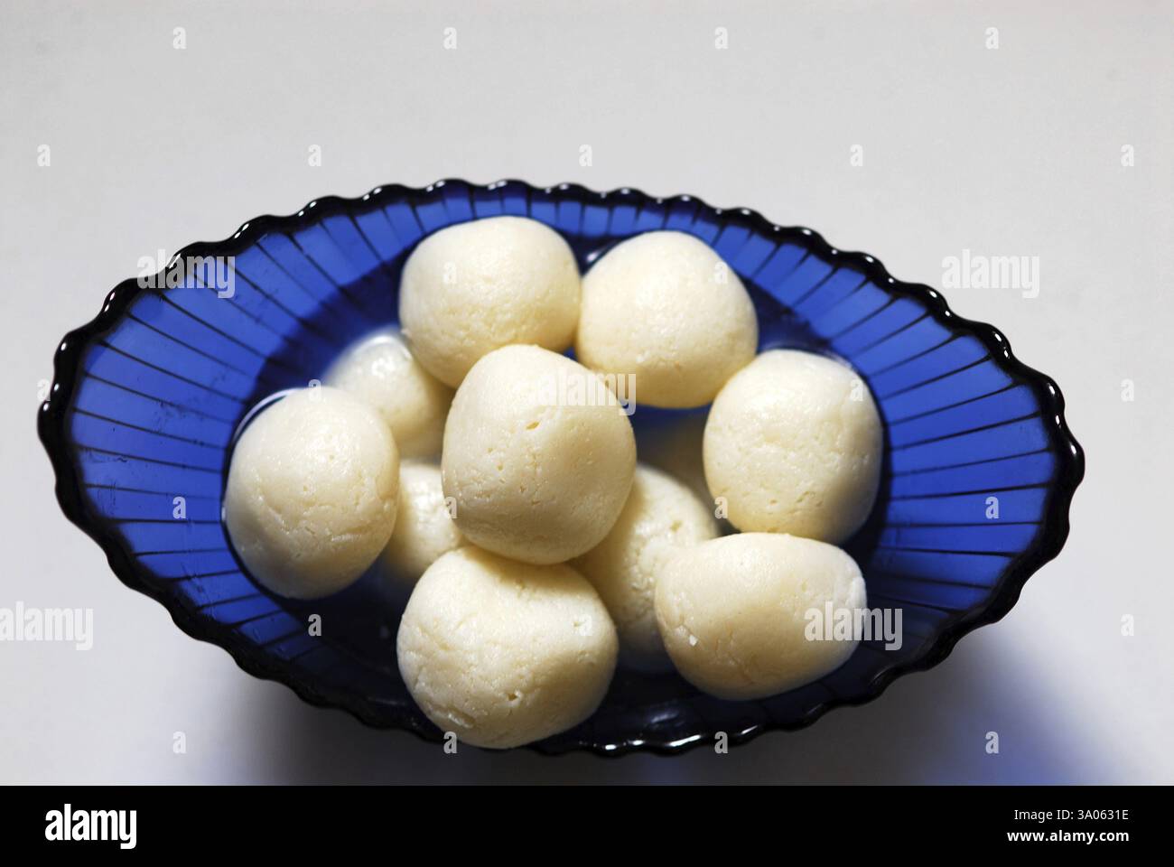 Bengali Rasogola or Rasgulla Popular Sweet Dish in Bengal Dipped in ...