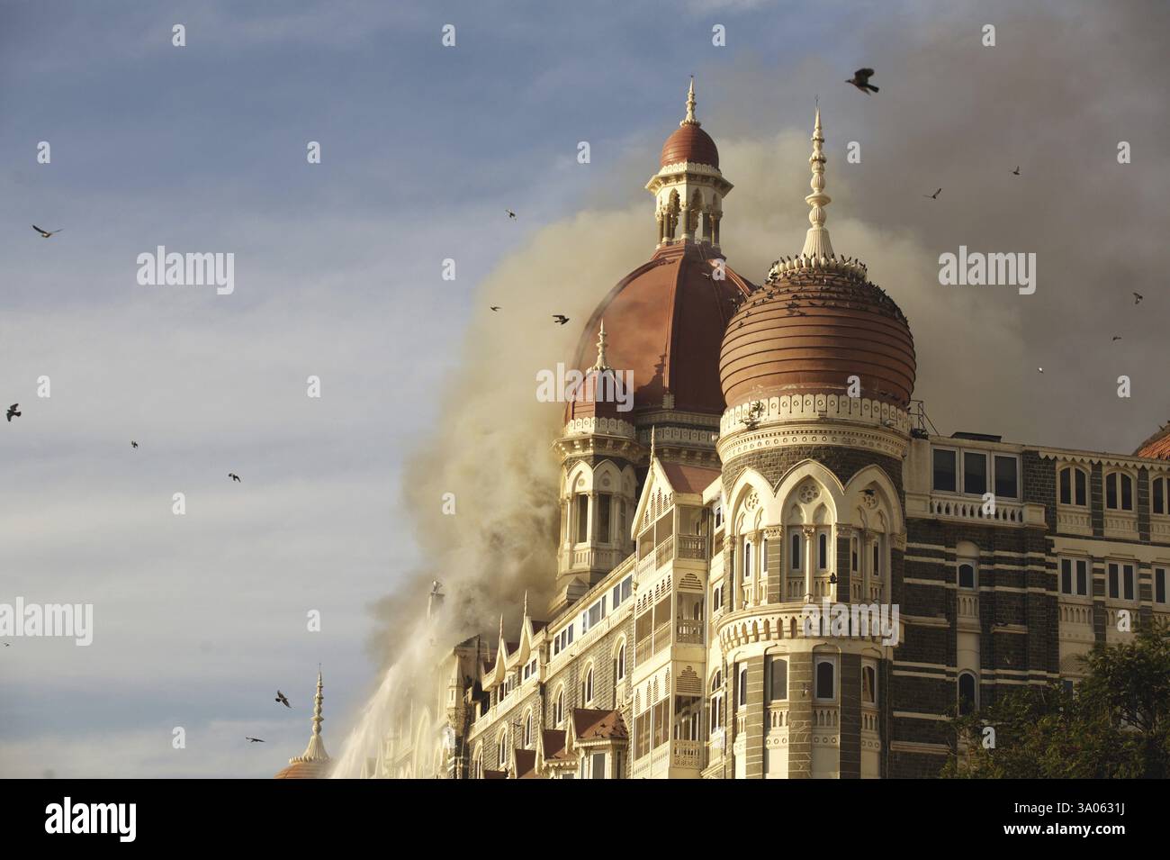 Smoke emits from Taj Mahal Hotel during terrorist attack by Deccan ...