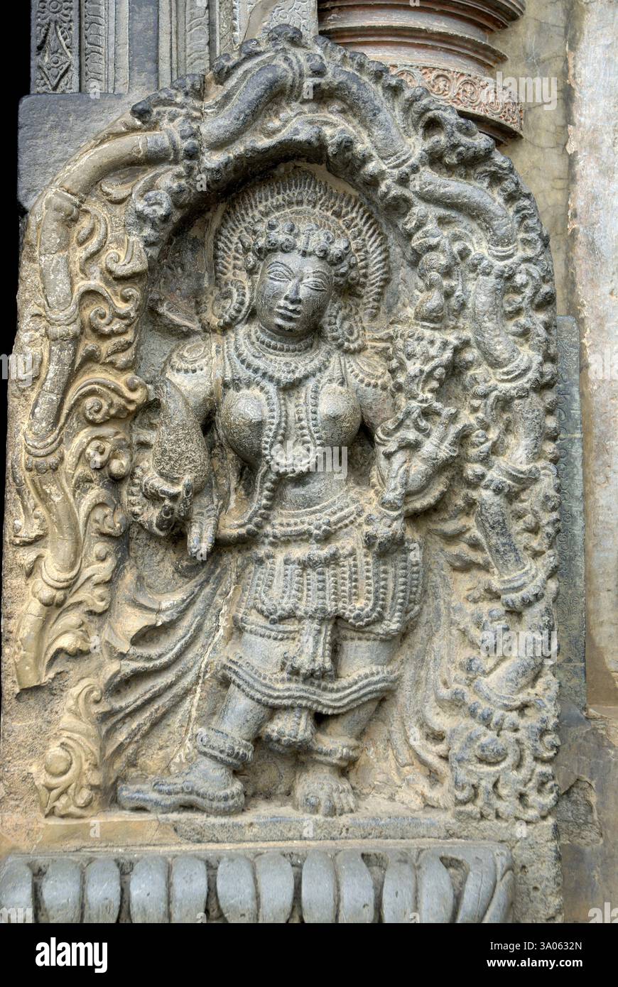 Statue of female figure on wall of Channakesava Vishnu temple, Belur ...