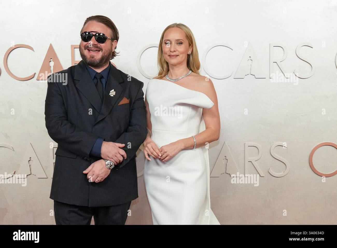 Brady Corbet, left, and Mona Fastvold arrive at the Oscars on Sunday ...