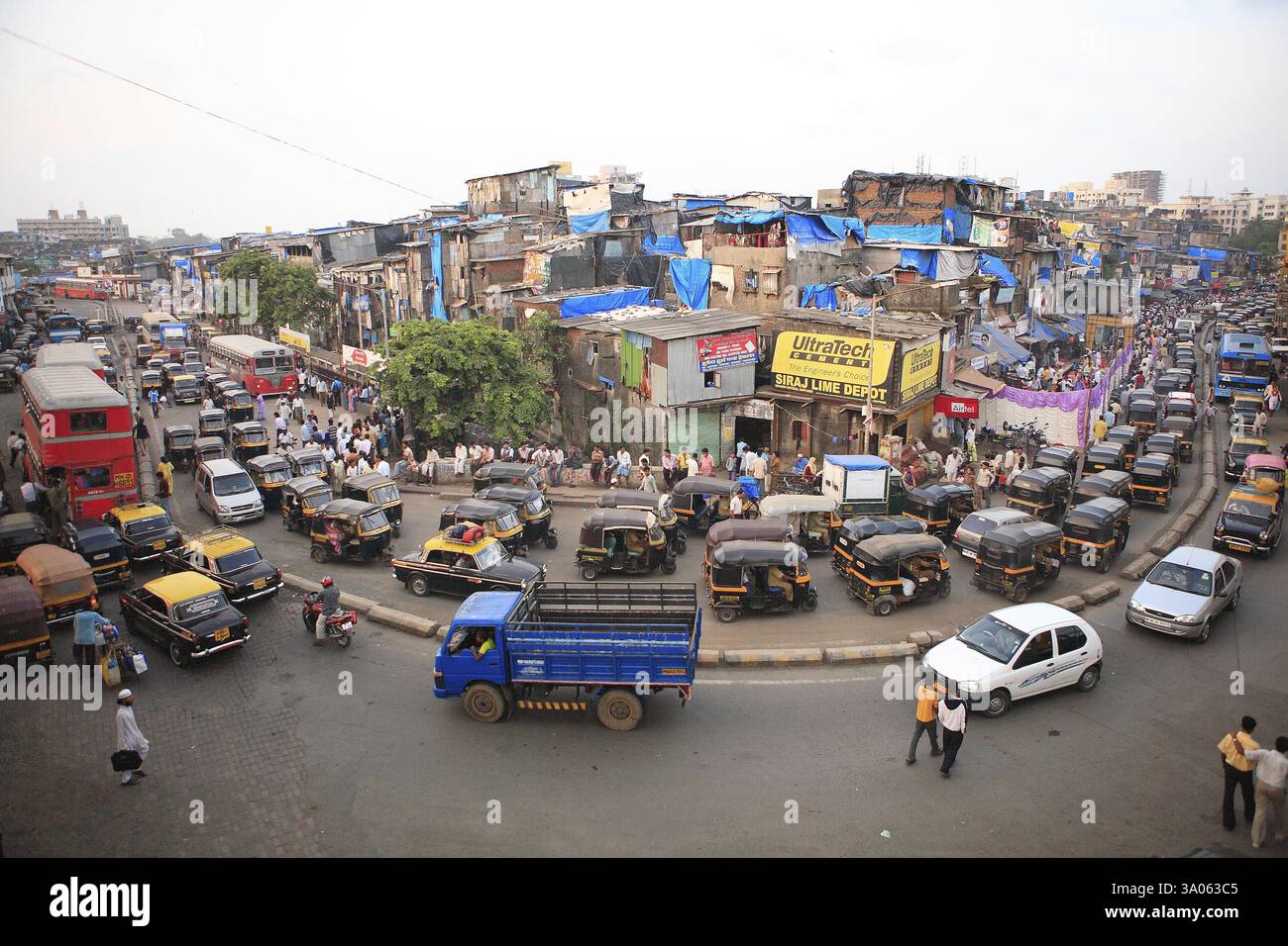 Skywalk, slums and traffic at Behrampada, Bandra, Bombay Mumbai ...