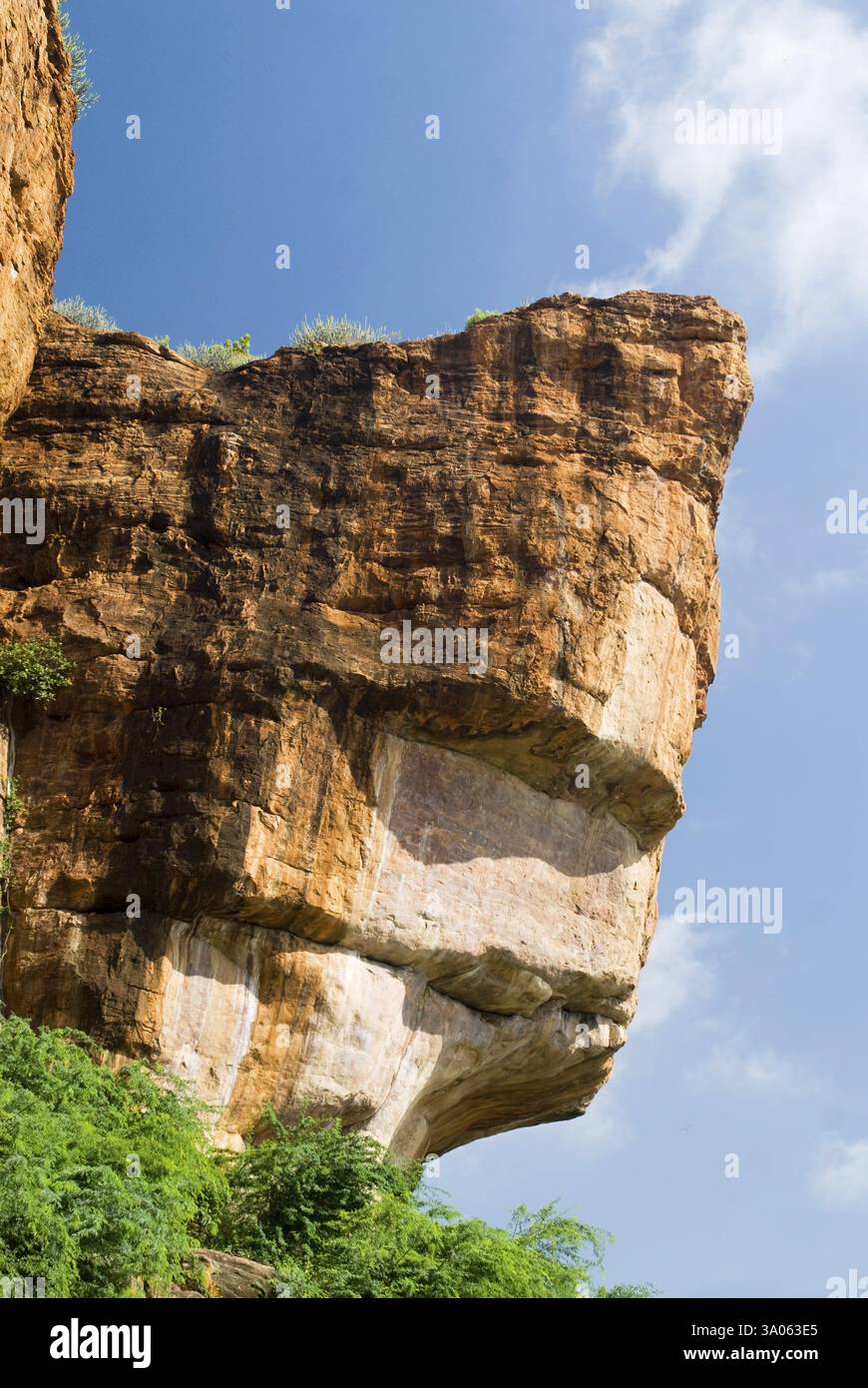 Rust red sandstone cliffs rocks in Badami, Karnataka, India, Asia Stock ...