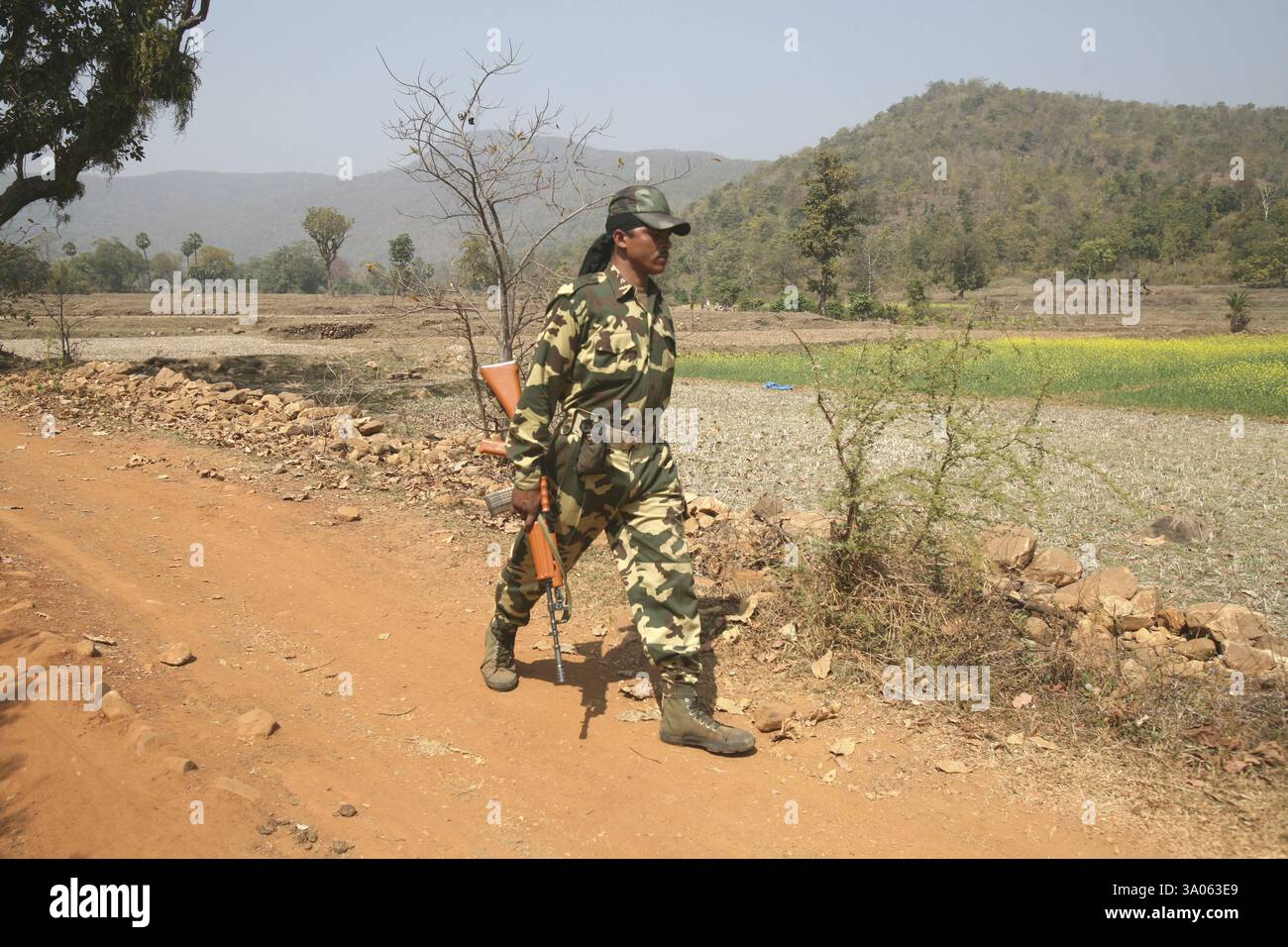 Central Reserve Police Force CRPF soldier with gun hunt for naxalites ...