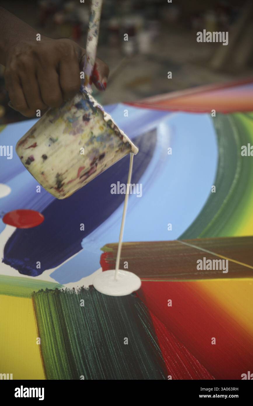 Indian contemporary artist Bose Krishnamachari in his studio working on ...