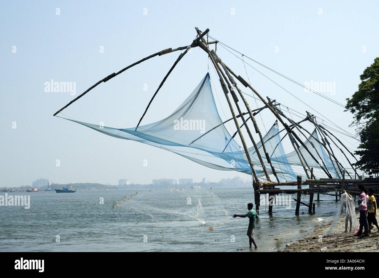 Fishermen casting nets at, Cochin Kochi, Kerala, India, Asia Stock ...