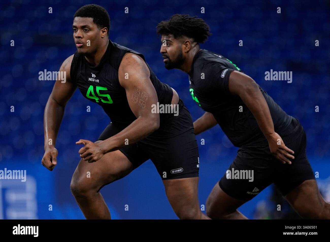Alabama A&M offensive lineman Carson Vinson, left, and Georgia ...