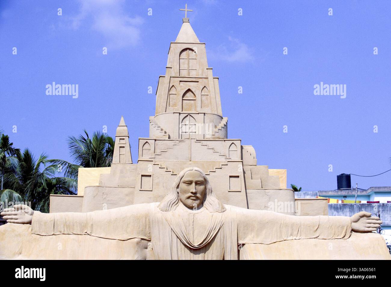 Image of lord Jesus in sand as decoration of pavilion of goddess Durga ...