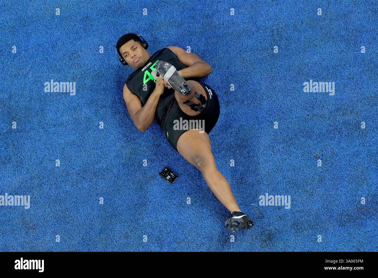 Alabama A&M offensive lineman Carson Vinson stretches at the NFL ...