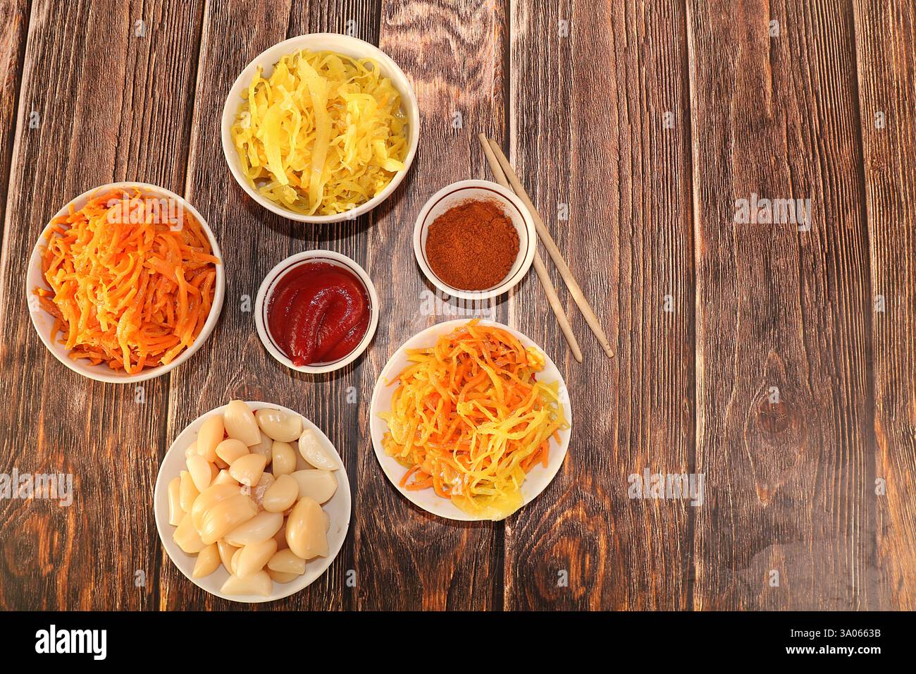 Korean side dishes, carrots, cabbage, kimchi and various kinds of ...