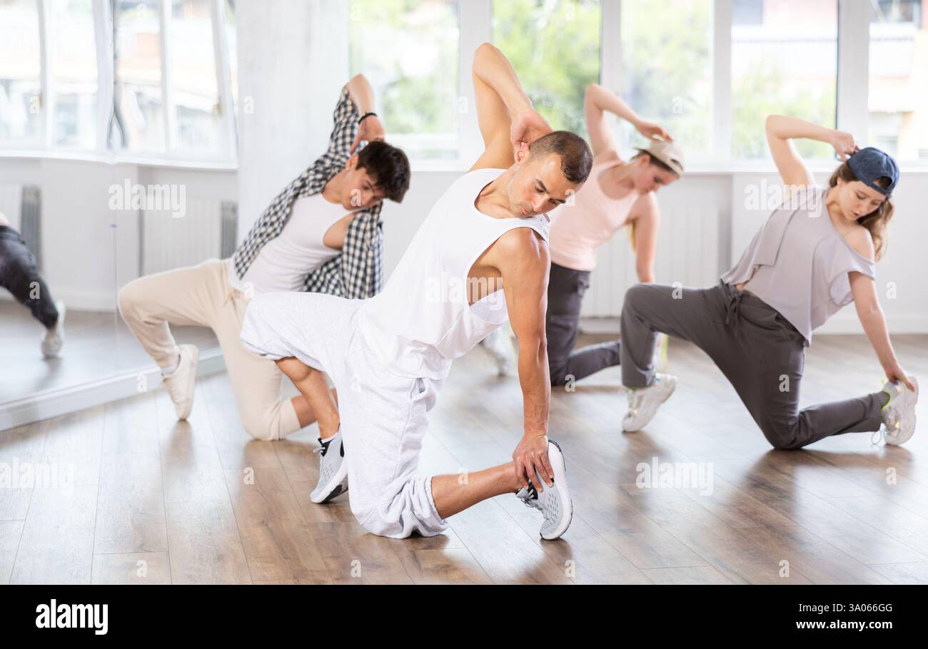 Break dance performed by a group of young dancers in dance studio Stock ...