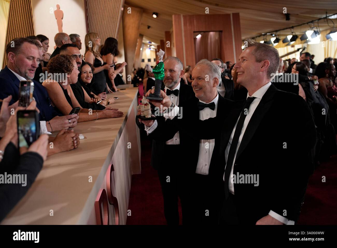 Richard Beek, from left, Nick Park and Merlin Crossingham arrive at the ...