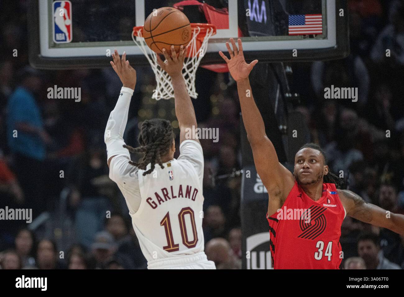 Cleveland Cavaliers' Darius Garland (10) shoots over Portland Trail ...