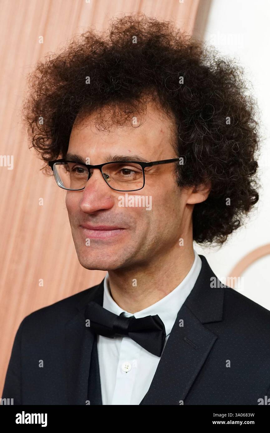 Nicolas Livecchi arrives at the Oscars on Sunday, March 2, 2025, at the ...