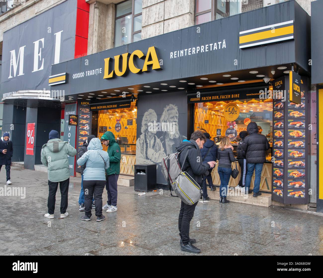 Bucharest, Romania - December 31, 2024: People visit fast food locals ...