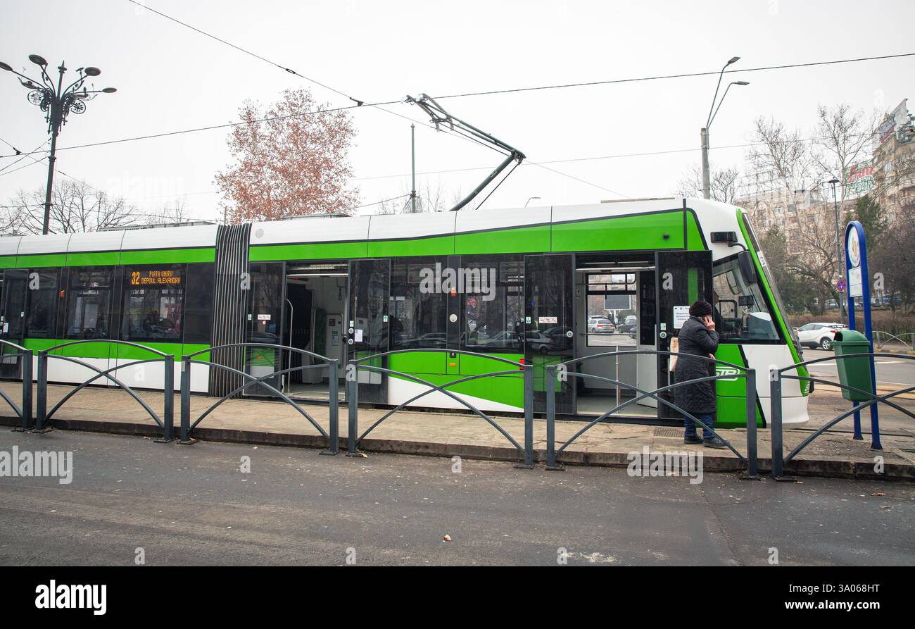 Bucharest, Romania - December 31, 2024: Cityscape with STB tram in ...