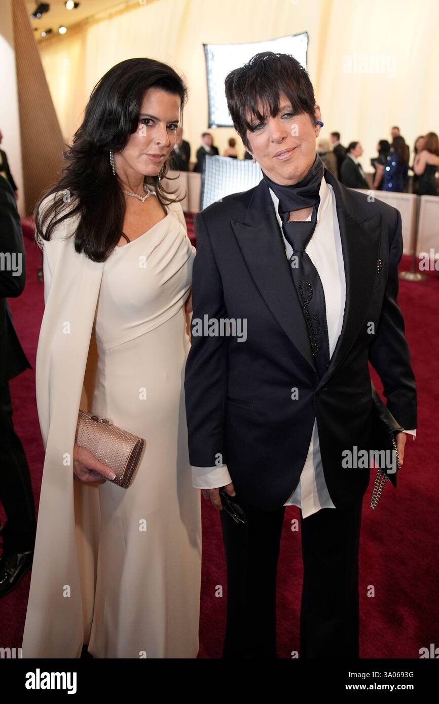 Keri Selig, left, and Diane Warre arrive at the Oscars on Sunday, March ...