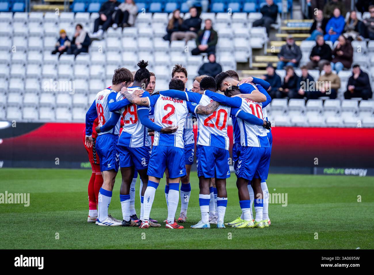 Odense, Denmark. 02nd Mar, 2025. The players of Odense BK unite in a ...