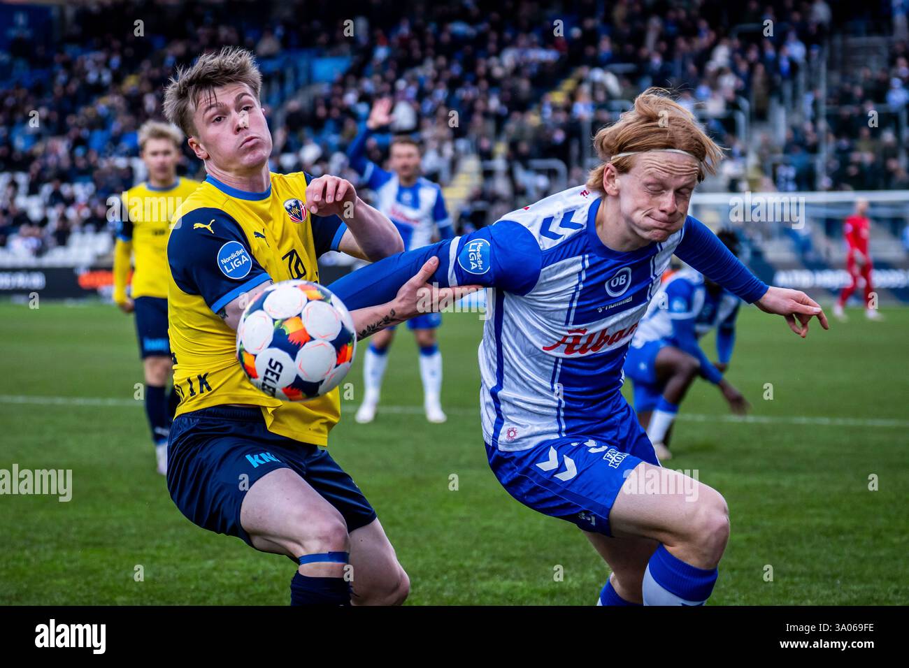 Odense, Denmark. 02nd Mar, 2025. Adam Sorensen (R) of Odense BK and Max ...