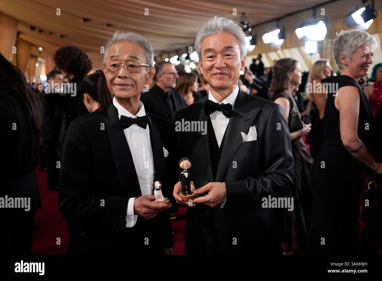 Daisuke Nishio, left, and Takashi Washio arrive at the Oscars on Sunday ...