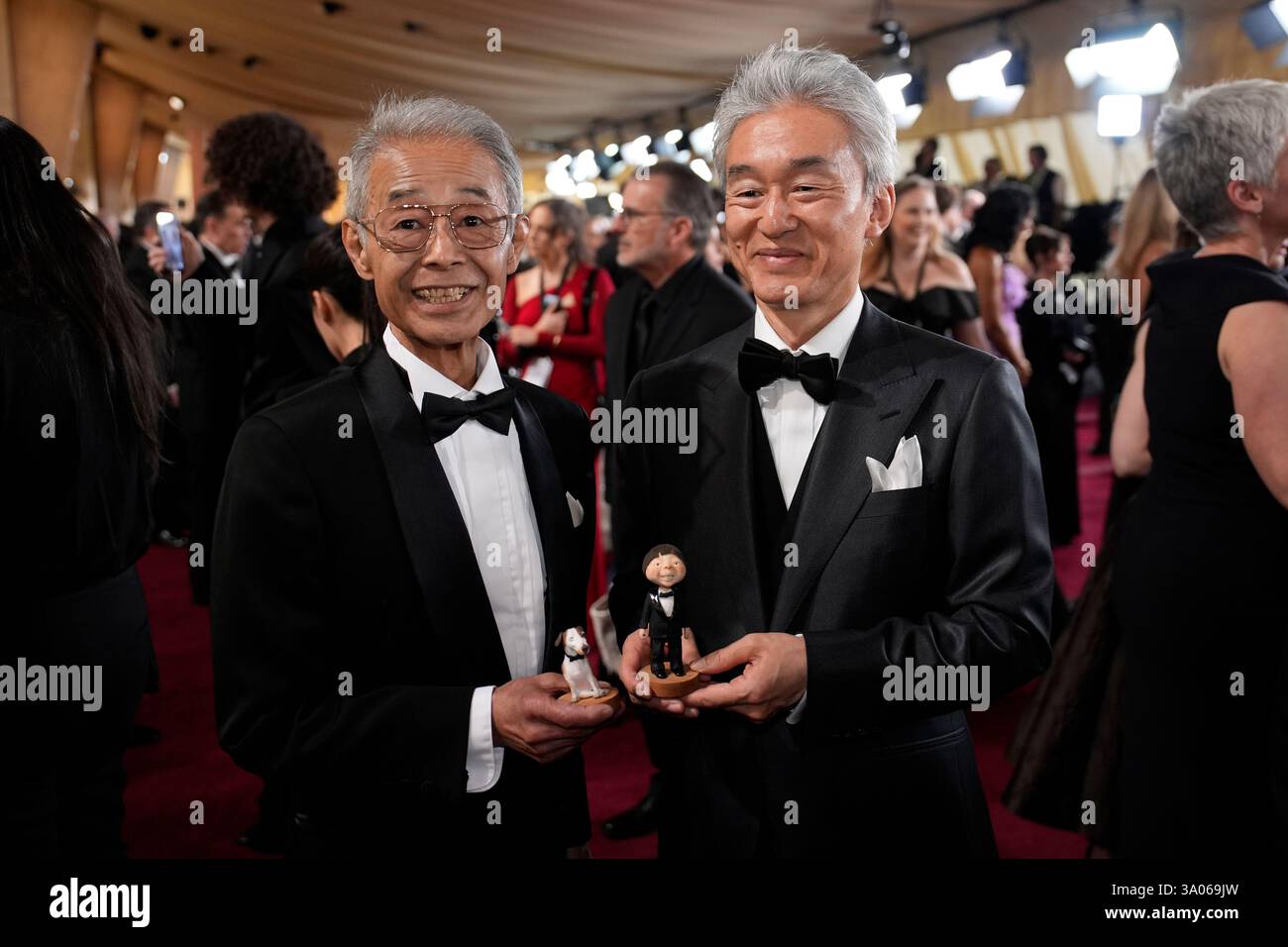 Daisuke Nishio, left, and Takashi Washio arrive at the Oscars on Sunday ...