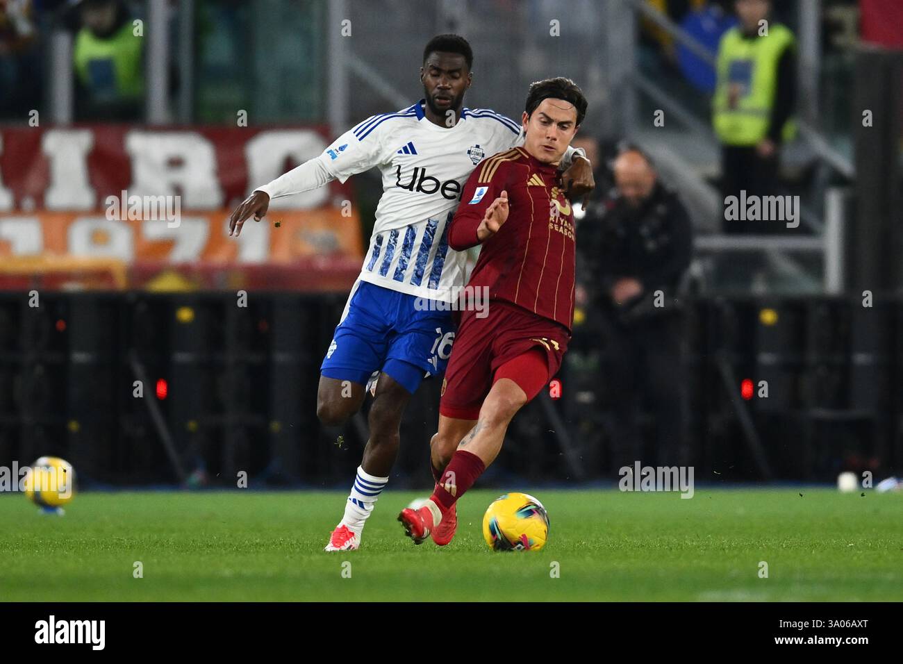 Alieu Fadera of Como 1907 and Paulo Dybala of A.S. Roma are in action ...